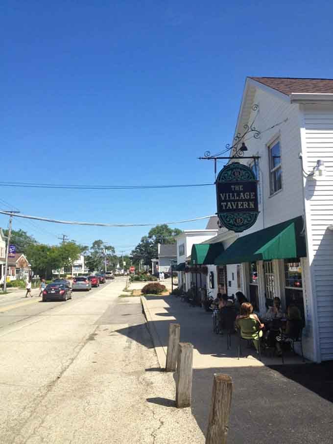 The street view says it all: historic charm, outdoor seating, and a building that's been the neighborhood's heart for generations.