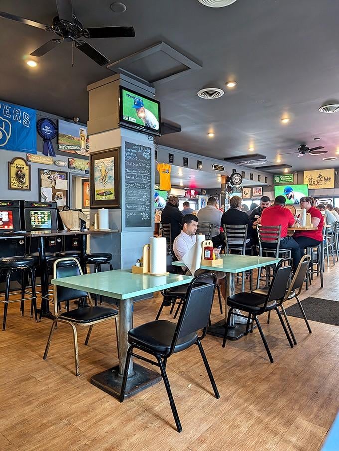 Multiple TVs, comfortable seating, and that lived-in feeling that makes you want to stay for another round.