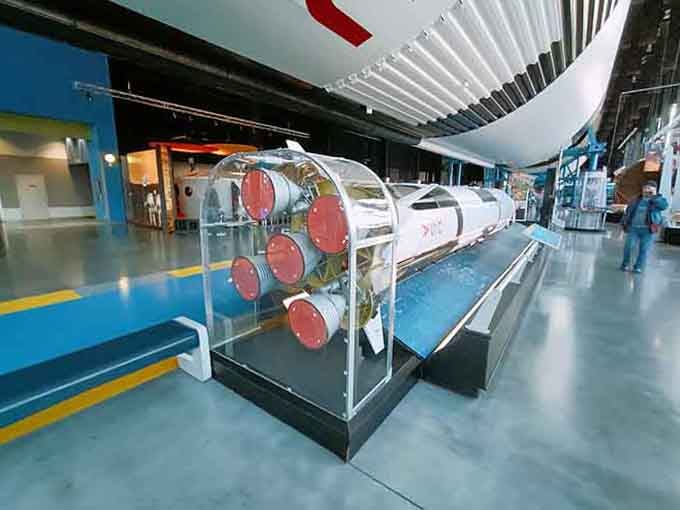 Rocket models inside demonstrate the engineering evolution that took us from Earth to the stars in just decades.