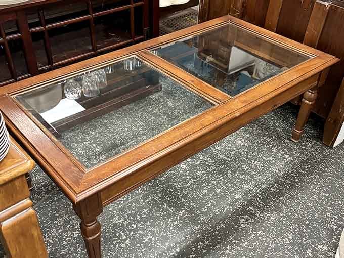 A glass-top coffee table that's survived decades intact, unlike your New Year's resolutions from last January.