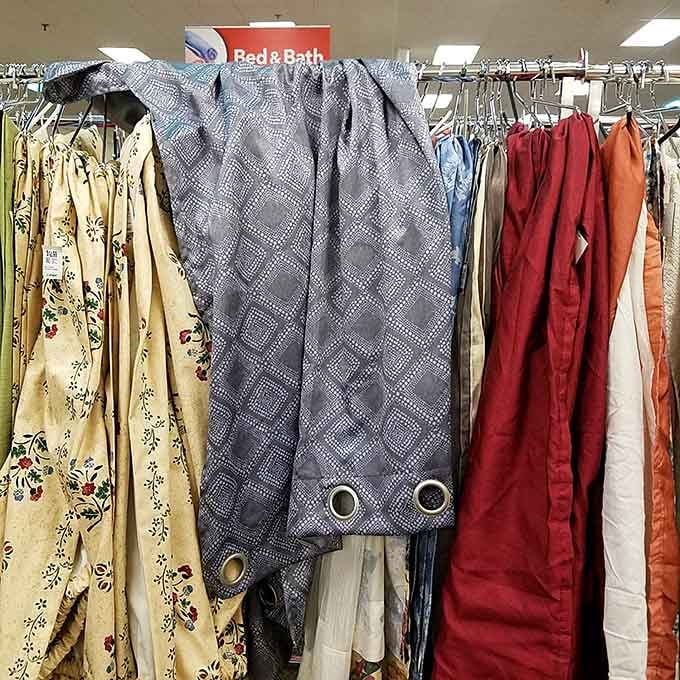 Curtains in every pattern remind us that someone, somewhere, genuinely loved that particular floral print.
