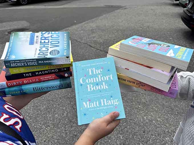 Fresh finds stacked in the parking lot showcase today's haul, from thrillers to comfort reads for every mood.