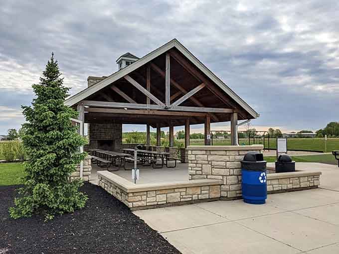 The covered picnic shelter where birthday parties become legendary and parents actually enjoy supervising because the setting's just that nice.