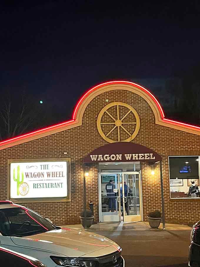 The Wagon Wheel glows like a welcoming lighthouse for hungry travelers navigating the backroads of Chester County after dark.