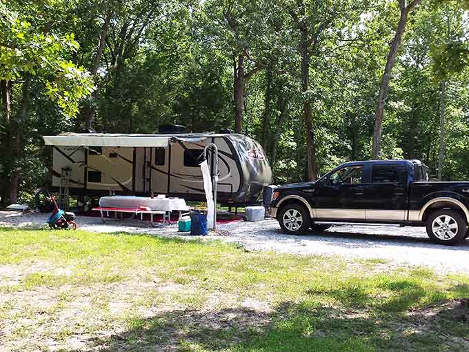 Your home away from home setup complete with awning extended, cooler at the ready, living that lakeside camping dream properly.