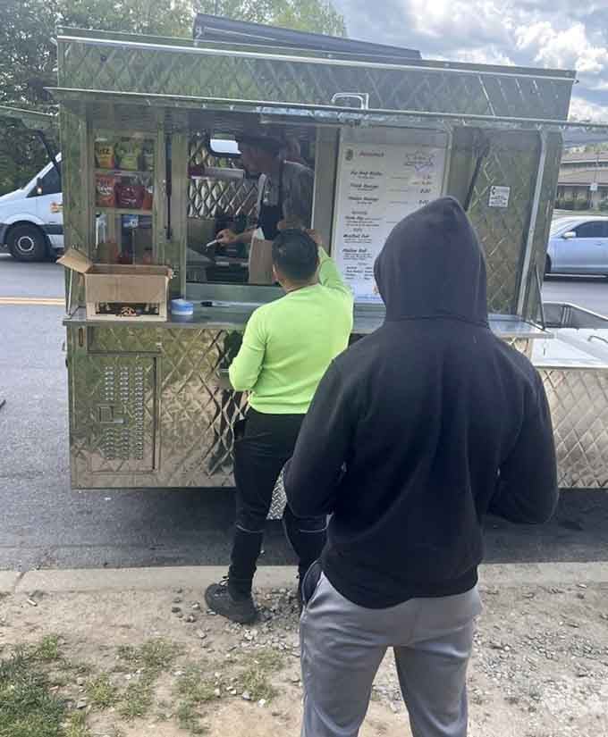 Rain or shine, Wayne's keeps serving, because good hot dogs wait for no weather forecast or convenient conditions.