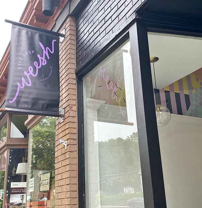 The distinctive Weesh signage welcomes visitors to discover handcrafted pastries that will permanently raise your expectations for what baked goods can and should be.