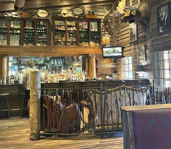 The bar area looks like it was assembled from a fishing enthusiast's dream collection, and honestly, we're here for it.
