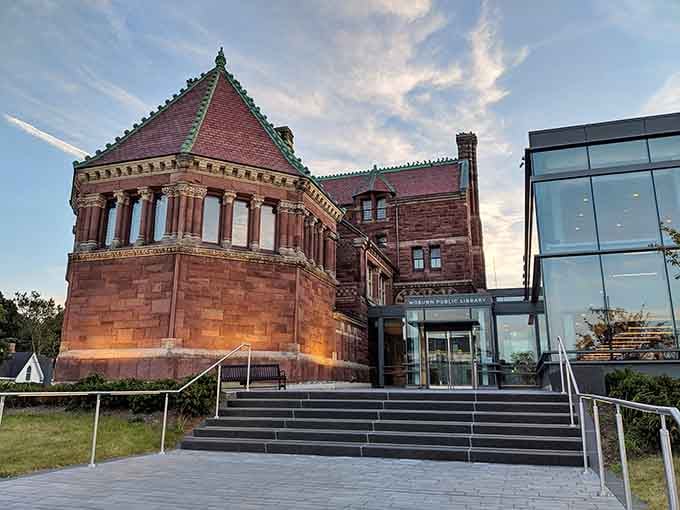 The Woburn Public Library's Romanesque architecture makes returning overdue books feel like a pilgrimage worth making, almost.