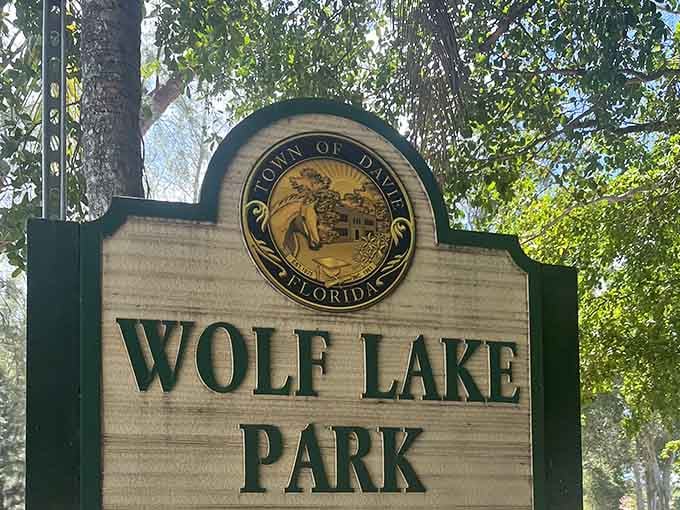 Wolf Lake Park's sign welcomes visitors to Davie's best-kept secret, though calling it secret feels increasingly generous now.