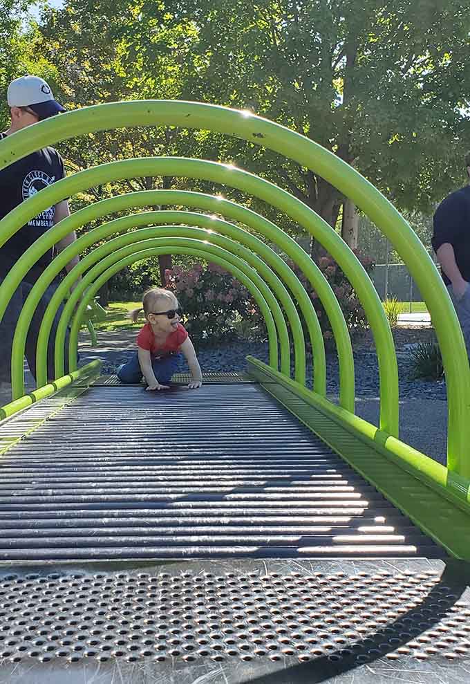 This roller table proves that sometimes the simplest ideas, like rolling along together, create the biggest smiles.