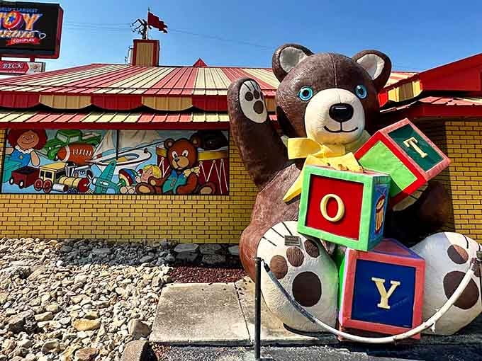 This oversized teddy bear with building blocks spells joy better than any dictionary definition ever could.