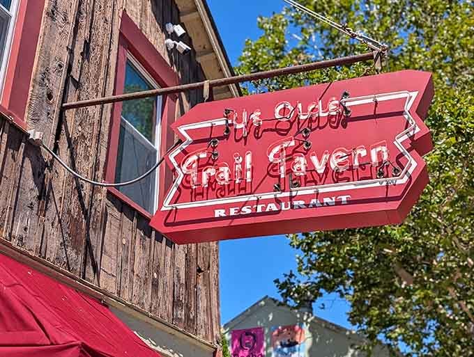 That vintage neon arrow has been pointing hungry travelers toward satisfaction since long before Instagram made signs cool again.