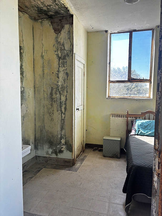 Bedrooms where patients once recovered now offer accommodations for visitors brave enough to spend the night with roommates.