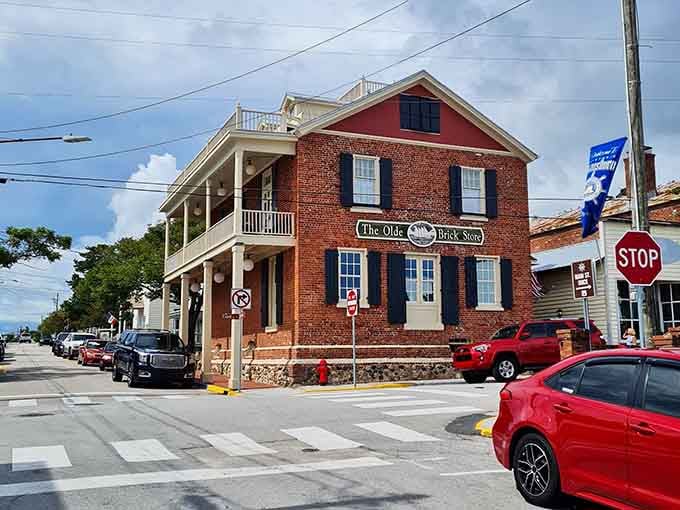 The old brick store anchors the corner with the kind of solid presence that inspires trust.