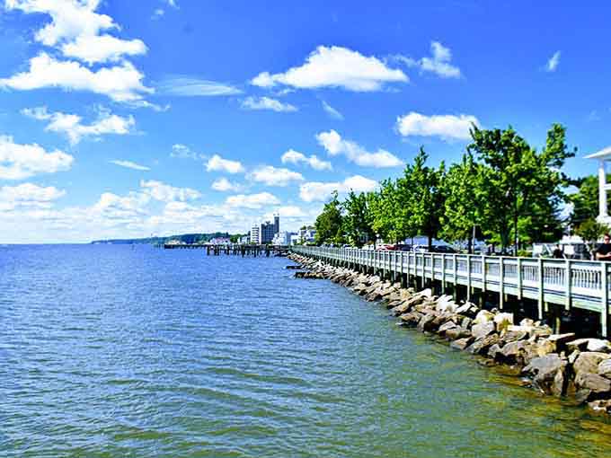 The rocky shoreline curves gently where the bay meets land, creating the kind of view that never gets old.