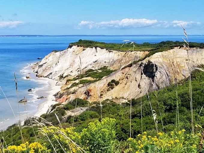 Mother Nature's layer cake rises from the Atlantic, striped in cream, rust, and gold like a geological dessert.