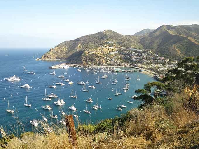 This harbor view rivals the French Riviera, with sailboats dotting turquoise waters like confetti on the Pacific.