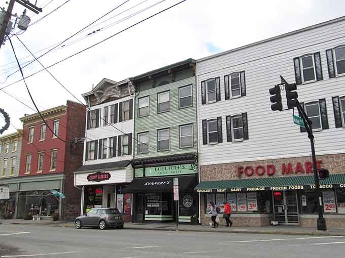 Classic storefronts line this historic main street where time moves slower and neighbors still wave hello.