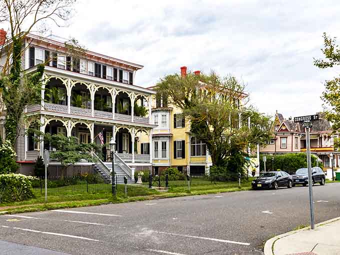 These grand Victorian porches whisper stories of lazy summer afternoons spent sipping lemonade and watching the world stroll by.