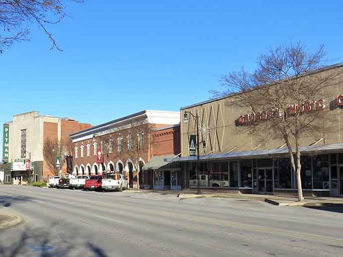 Classic downtown architecture meets clear blue skies in this charming riverside community that knows its worth.