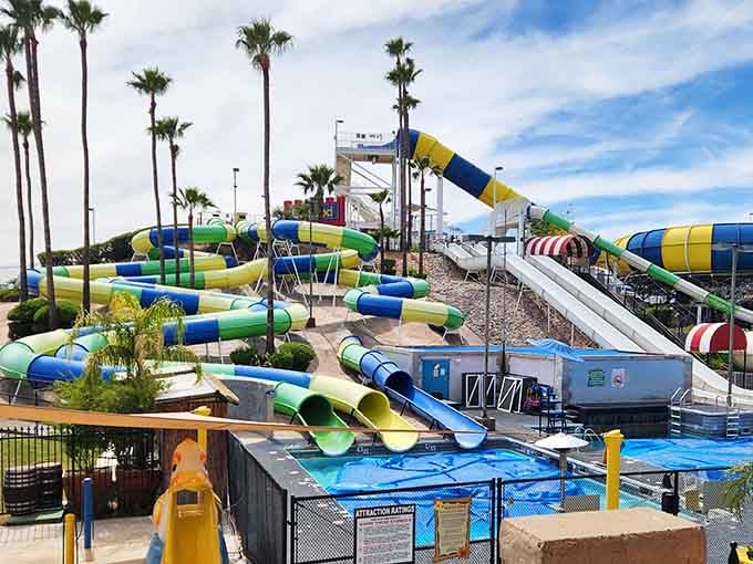 Look at this rainbow of twisting water slides reaching for the sky like colorful spaghetti gone wonderfully wild!