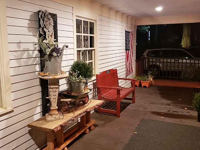 That welcoming porch with the red chair says "sit down, relax" before you even taste the steak.