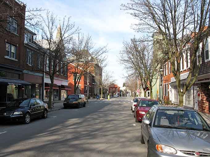 Brick buildings and bare winter trees create that classic small-town feeling where everyone still waves at strangers.