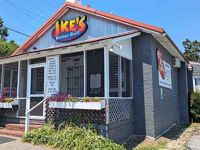 That cheerful yellow sign and red roof combo practically waves you down from the street like a friendly neighbor.