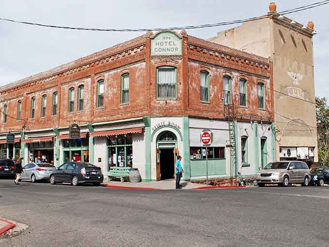 Historic brick buildings cling to the mountainside like they're defying gravity in this charming mining town.