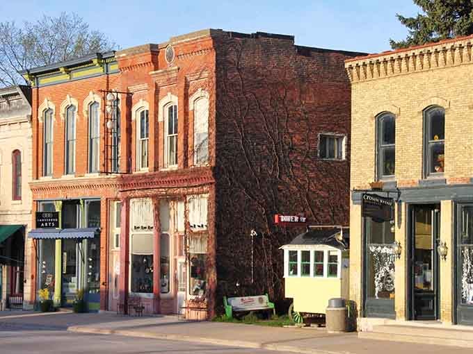 These colorful storefronts look like someone arranged a box of crayons into actual buildings and forgot to tell anyone.
