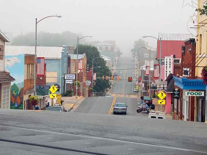 Morning mist rolls through this mountain town like nature's own special effect, wrapping everything in mystery.