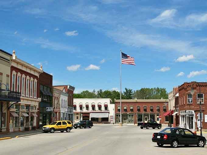 Classic Main Street America with brick facades and that flag waving proudly&mdash;this is where time slows down beautifully.