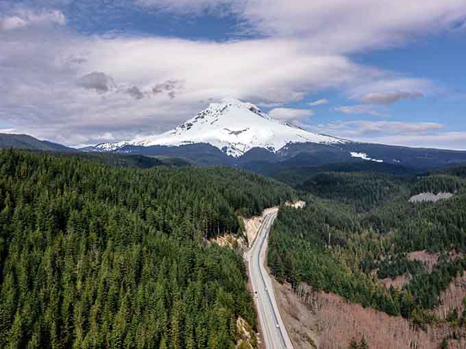 Mount Hood rises like nature's perfect snow cone, watching over forests so green they'll make your eyes happy.