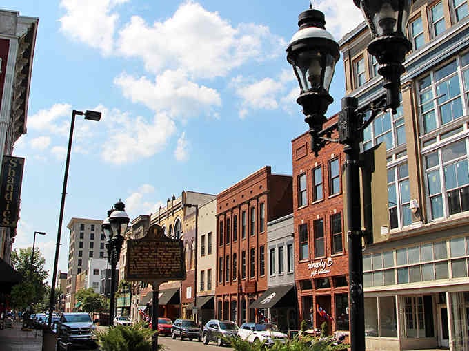 Historic brick buildings and vintage lampposts create a downtown that feels like stepping into a beloved classic film.