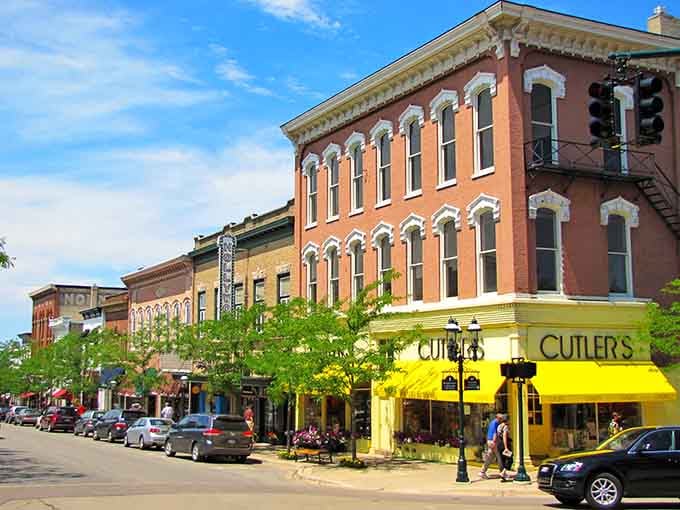 Classic brick storefronts line the street like a Norman Rockwell painting come to life on a perfect summer day.
