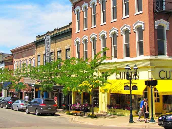 Look at those historic storefronts glowing like butter in the sunshine, each one begging you to explore.