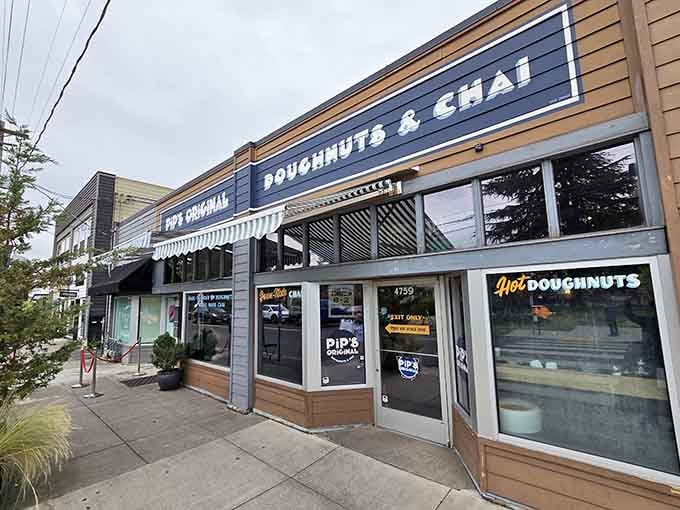 This charming storefront shares space with neighbors, creating a cozy Portland street scene worth exploring on foot.