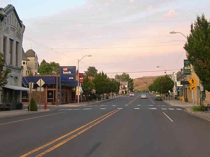 Golden hour paints this quiet main street in shades that remind you why small towns feel timeless.