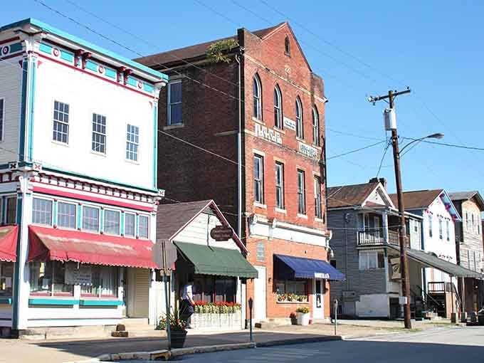 These colorful storefronts look like someone painted Main Street with a rainbow and nobody complained about it.