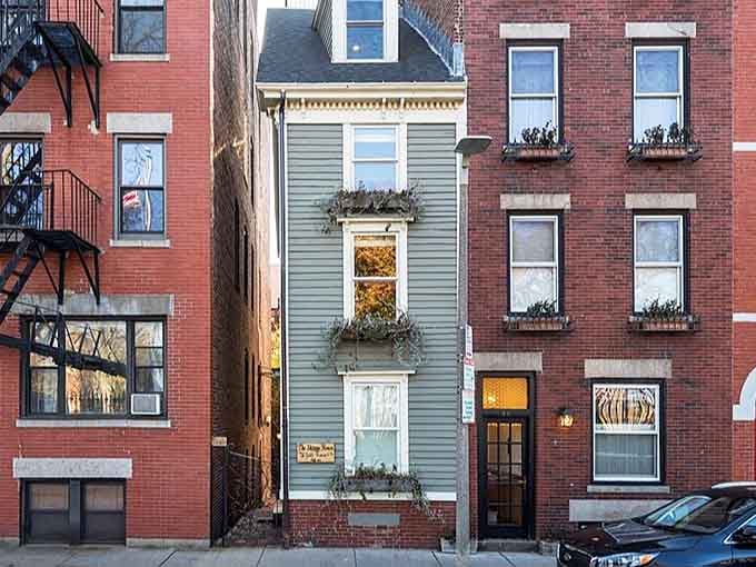 Boston's skinniest home stands tall between brick neighbors, proving good things really do come in narrow packages.