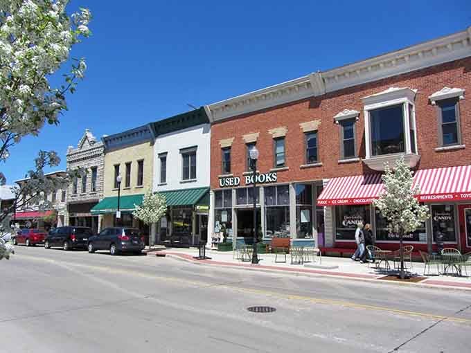 Grab a book and some chocolate; these charming brick storefronts and blooming trees are straight out of a storybook.