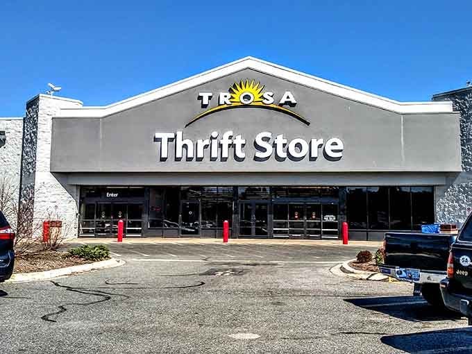That cheerful sunshine logo above the entrance promises bright discoveries inside this treasure-filled thrift paradise.