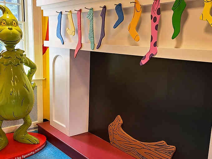 Look who's plotting Christmas mischief again - that familiar green grin watching over colorful socks like a whimsical laundry supervisor.