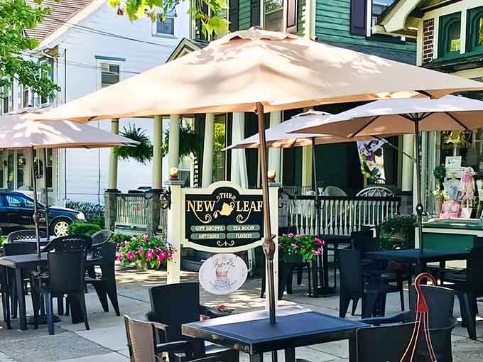 That charming outdoor seating beckons like a Victorian postcard come to life on Main Street.