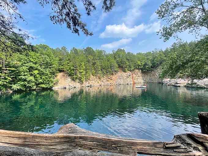 That emerald water surrounded by granite cliffs looks like something from a postcard you'd never believe was real.
