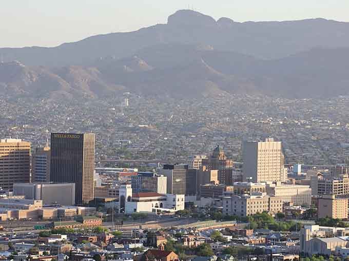 Downtown El Paso spreads beneath the Franklin Mountains like a sun-baked promise of affordable living and authentic Southwestern charm.