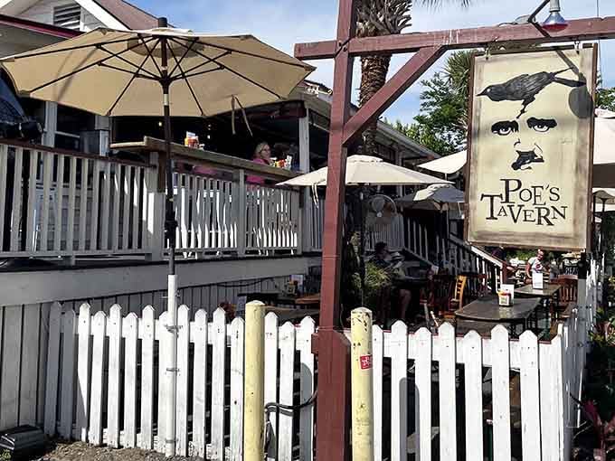 That iconic Poe portrait welcomes you with brooding eyes, promising burgers worth contemplating deeply and deliciously.