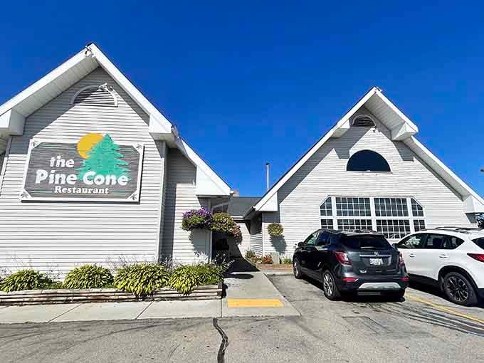 That Pine Cone sign against a brilliant blue sky says one thing: good food lives here.
