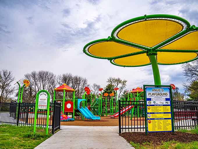 That giant flower shade structure isn't just adorable, it's also keeping kids cool while they play all day long.